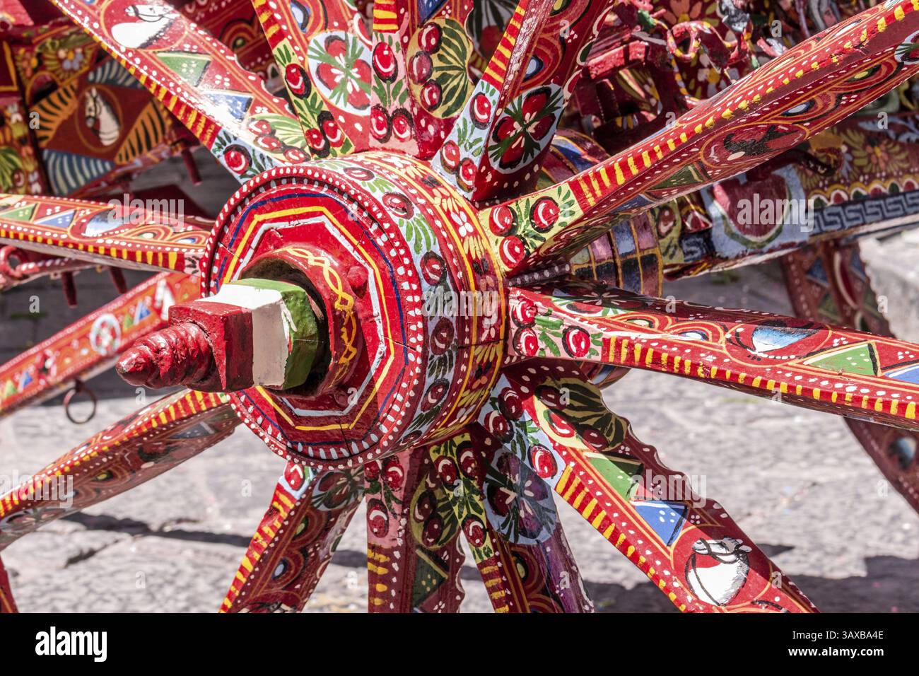 Sicilian cart, art, painting wooden wheels, a typical Stock Photo - Alamy