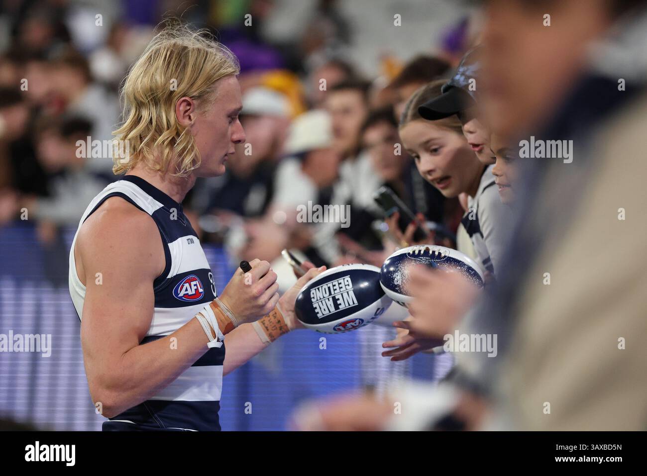 Melbourne, Australia. 21st Apr, 2025. Oliver Dempsey of the Cats greets ...