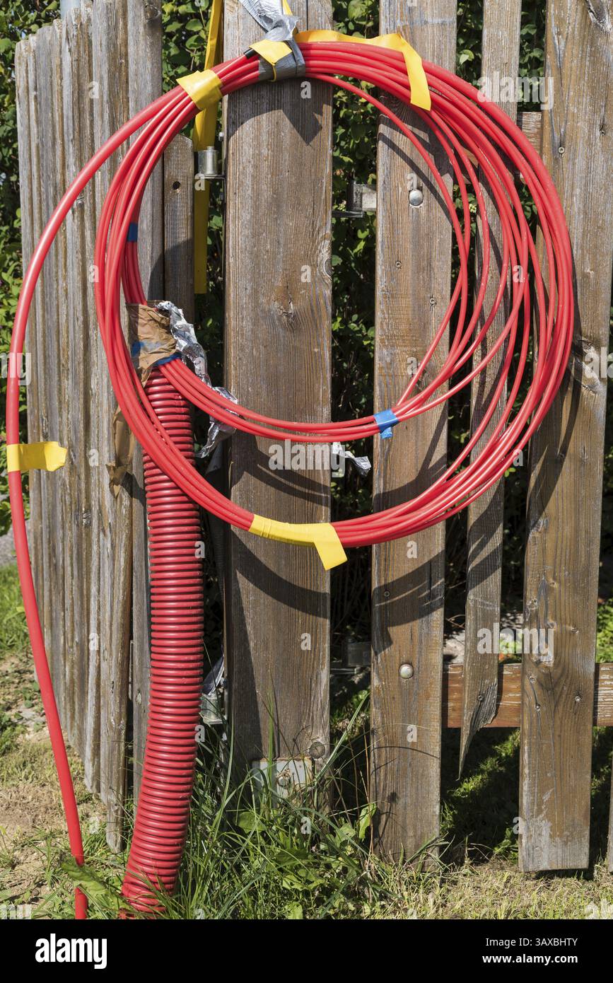 Red empty conduit with photovoltaic cable and solar cable - PV system ...