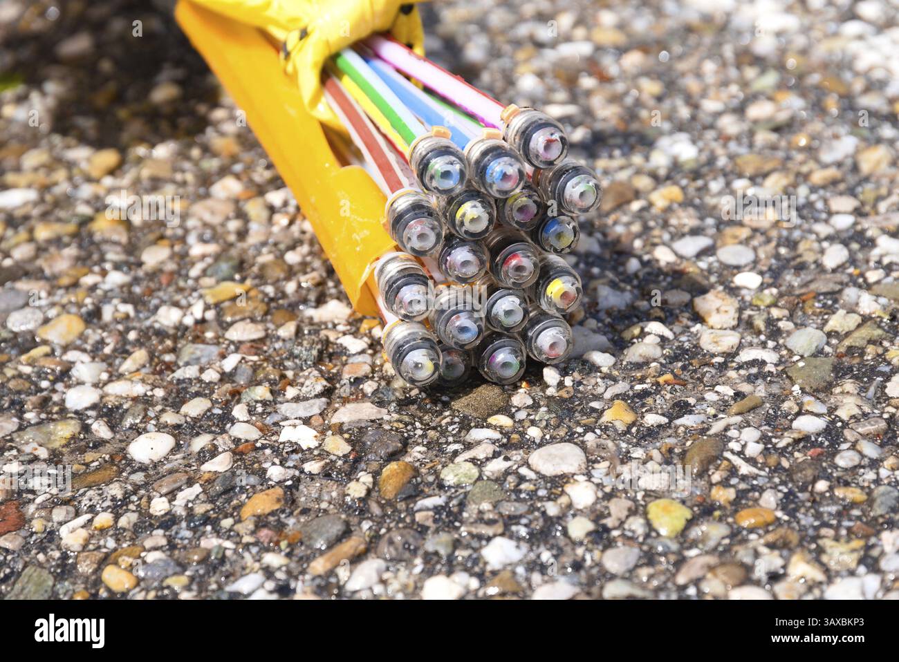 Fibre optic cable on the asphalt - connection for fast internet - close ...