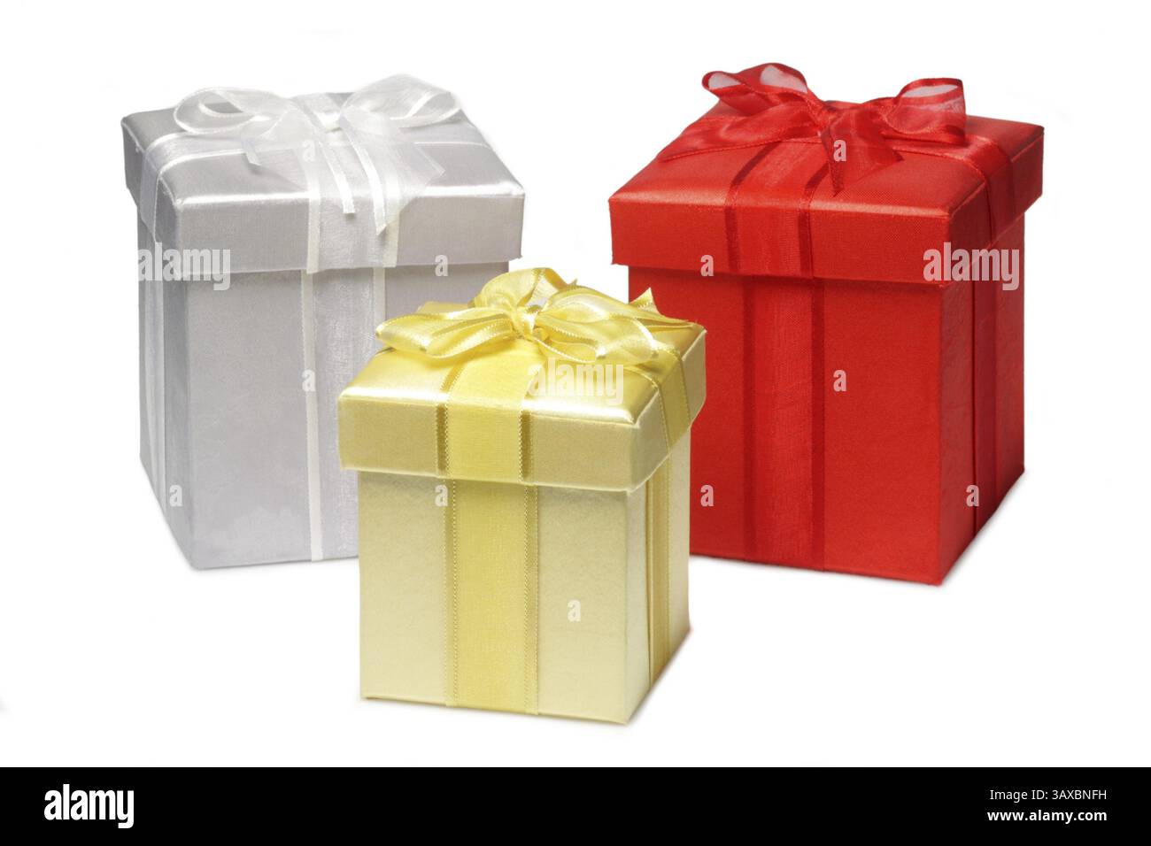 Different coloured gift boxes - cropped on a white background Stock ...