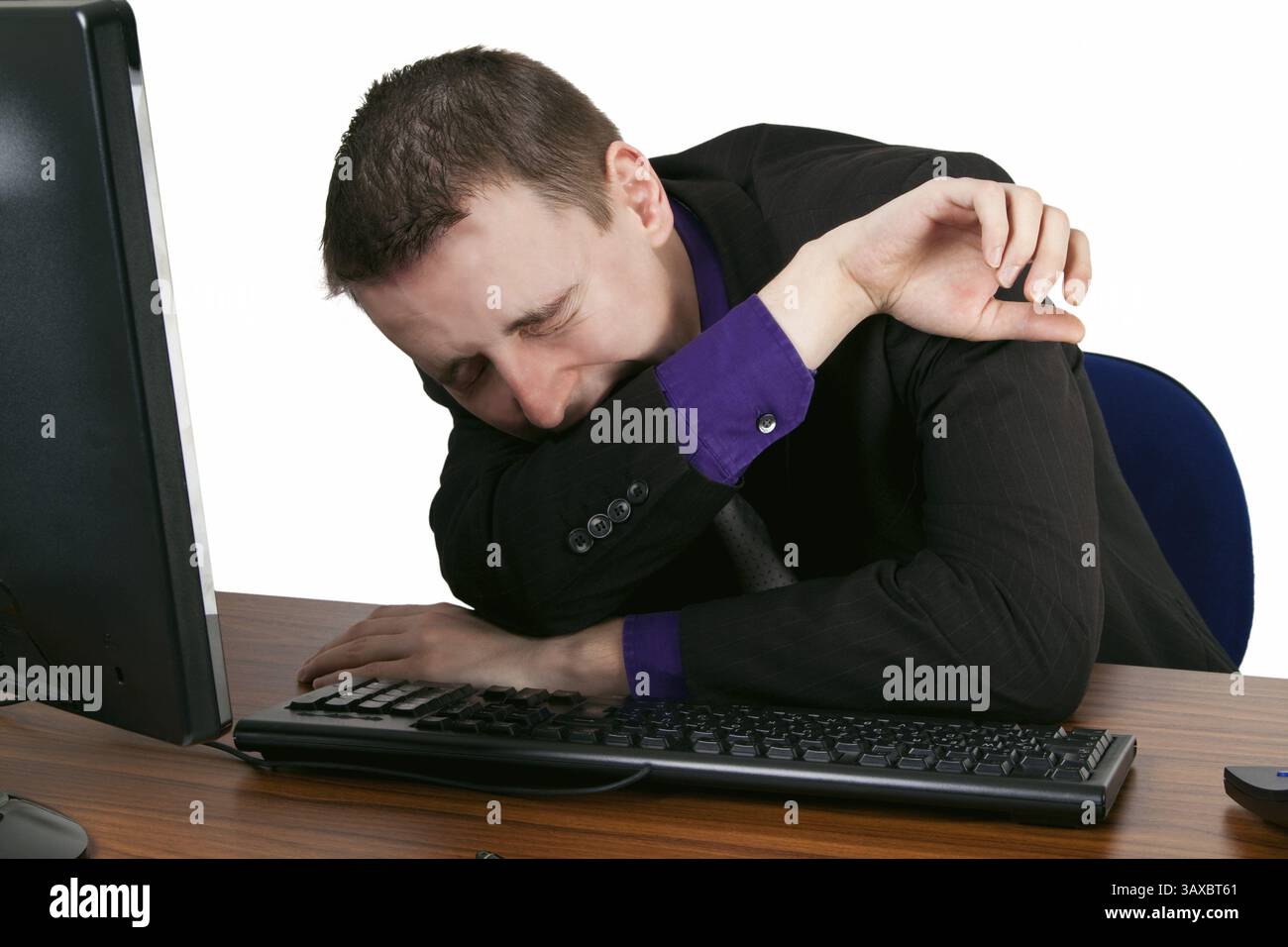 Young businessman falling asleep at his desk - Freisteller Young ...