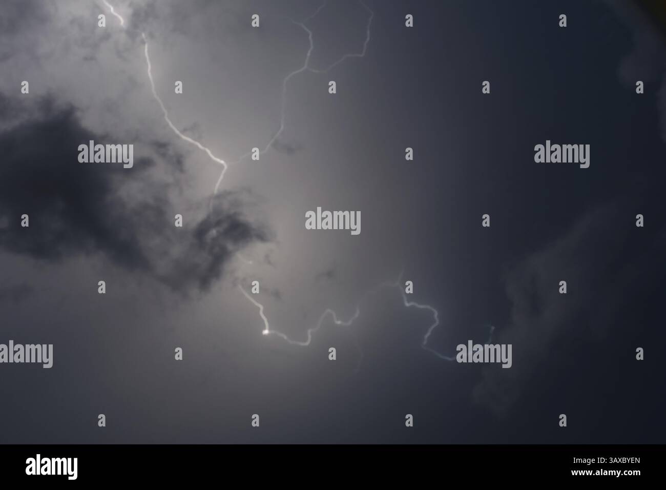 Lightning in a violent storm in the dark sky Stock Photo - Alamy
