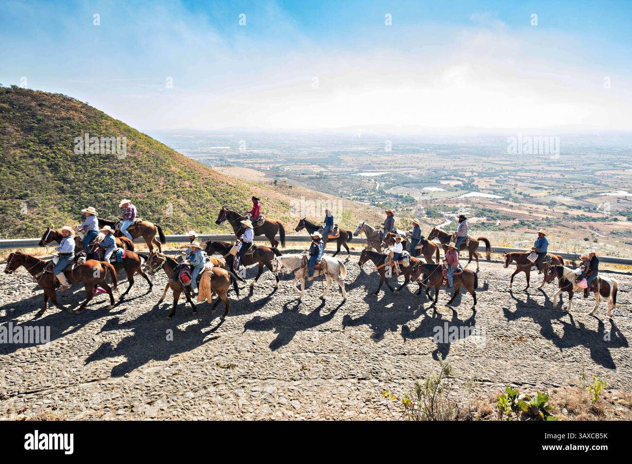 Three cowboys on horseback hi-res stock photography and images - Alamy
