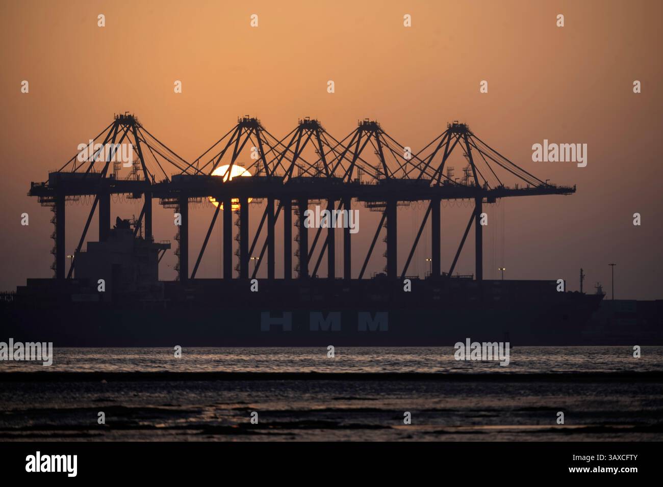 Sunset view of Port of Karachi. China Port Karachi Oyster Rocks Stock ...