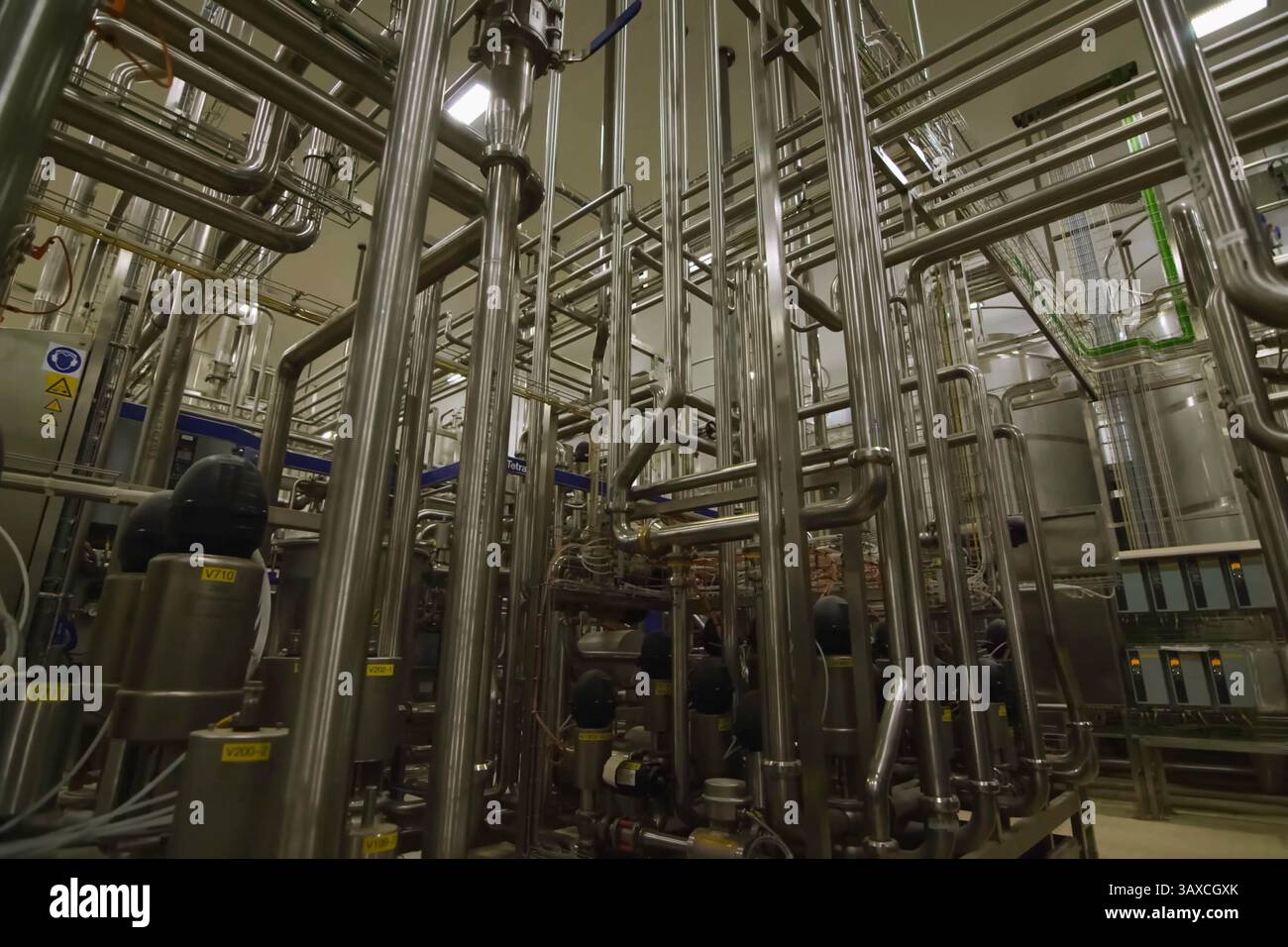 Stainless steel piping in a dairy. Food industry Stock Photo - Alamy