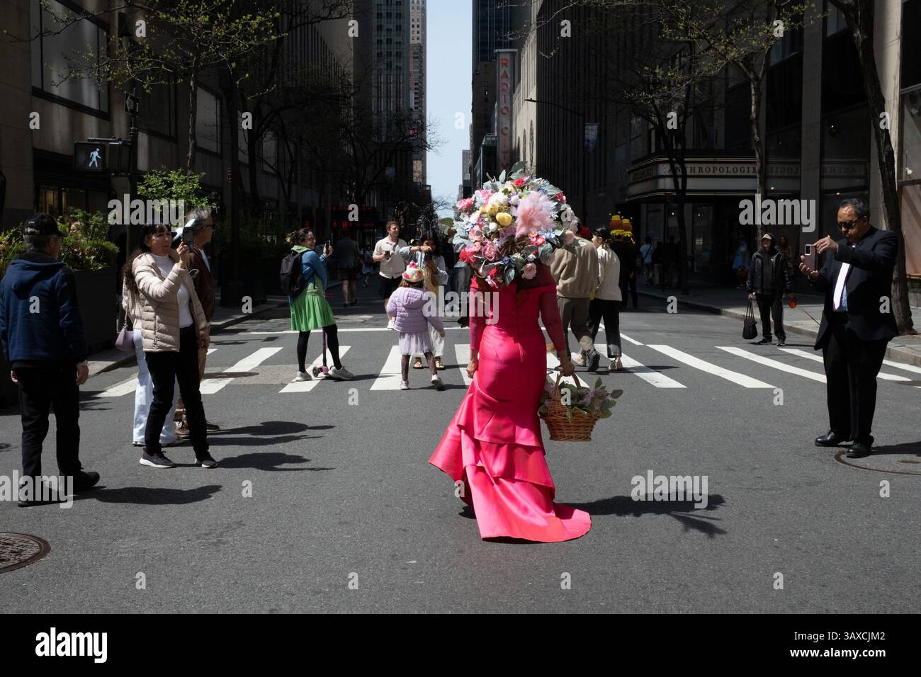 A woman leaving the Easter Parade near Rockefeller Plaza. The hats were ...