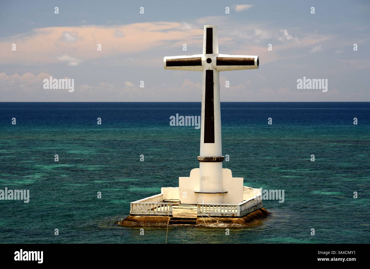 Grave with cross at sunken cemetery, Camiguin Island, Philippines Stock ...