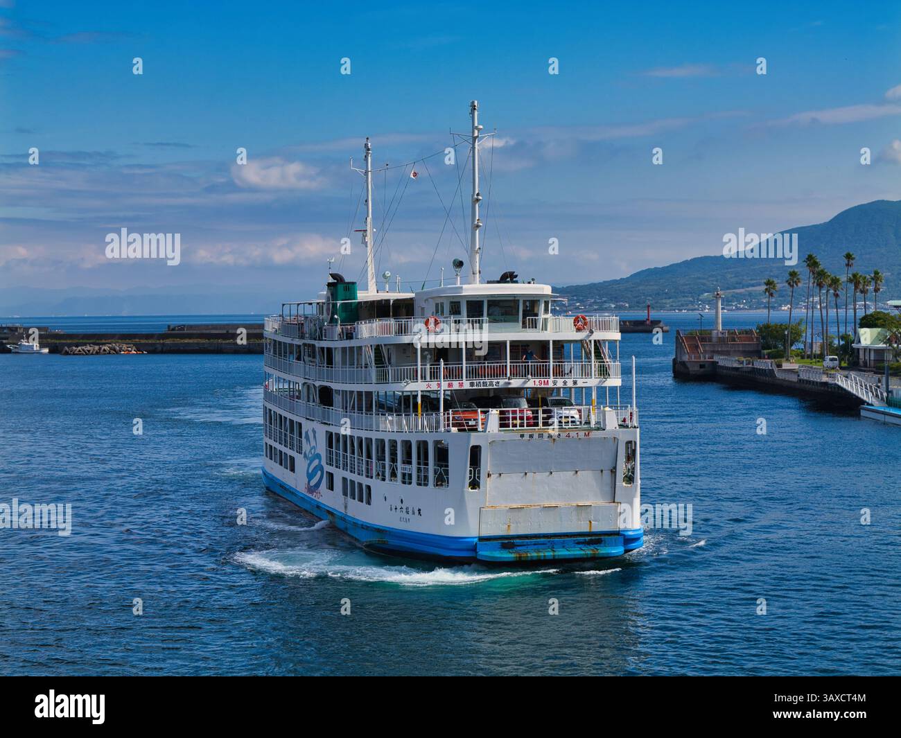 The ferry to Sakurajima in Kagoshima, Kyushu, Japan, sailing on a clear ...