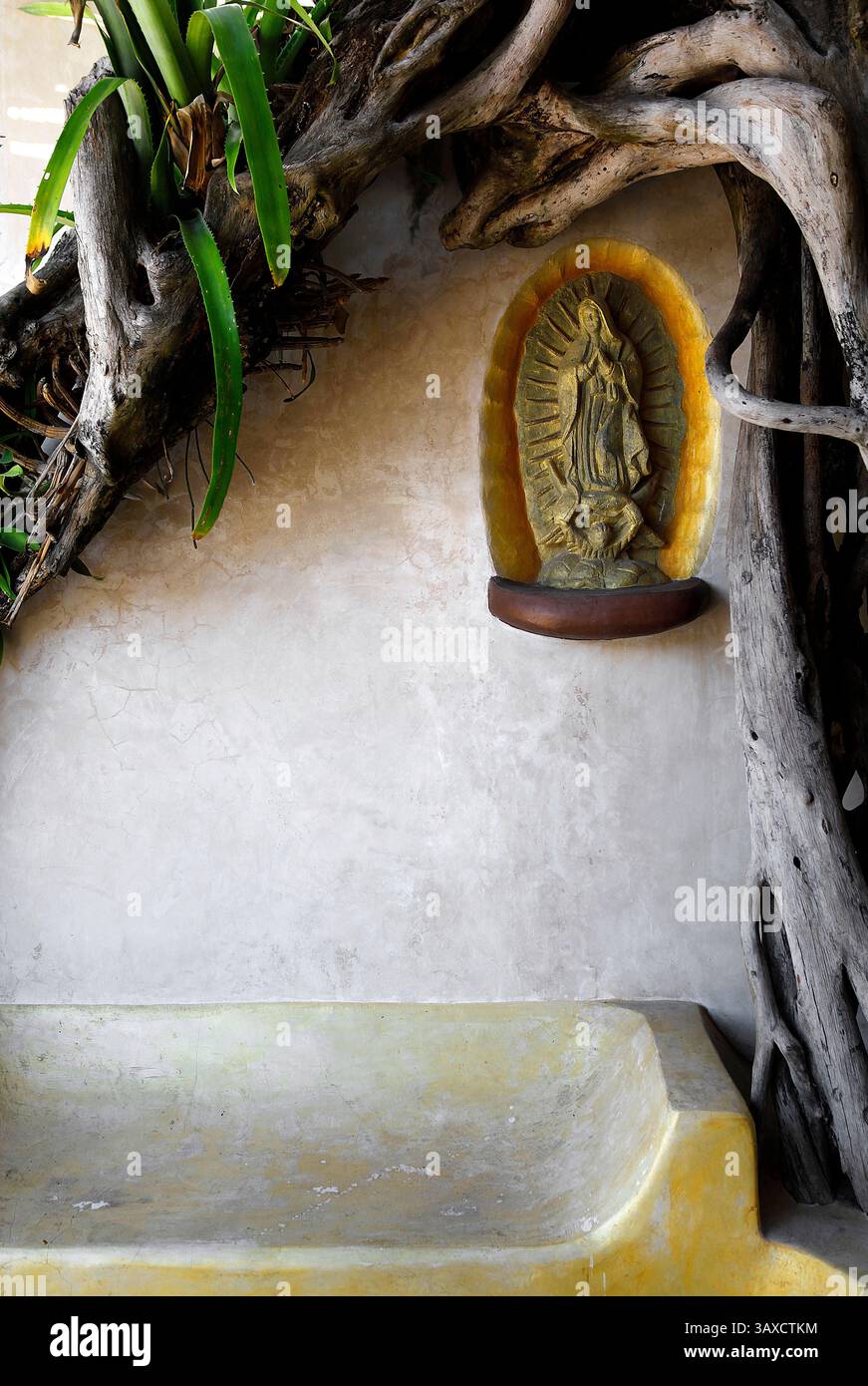 A nicho featuring Our Lady of Guadalupe in Tulum, Mexico. A nicho is an ...