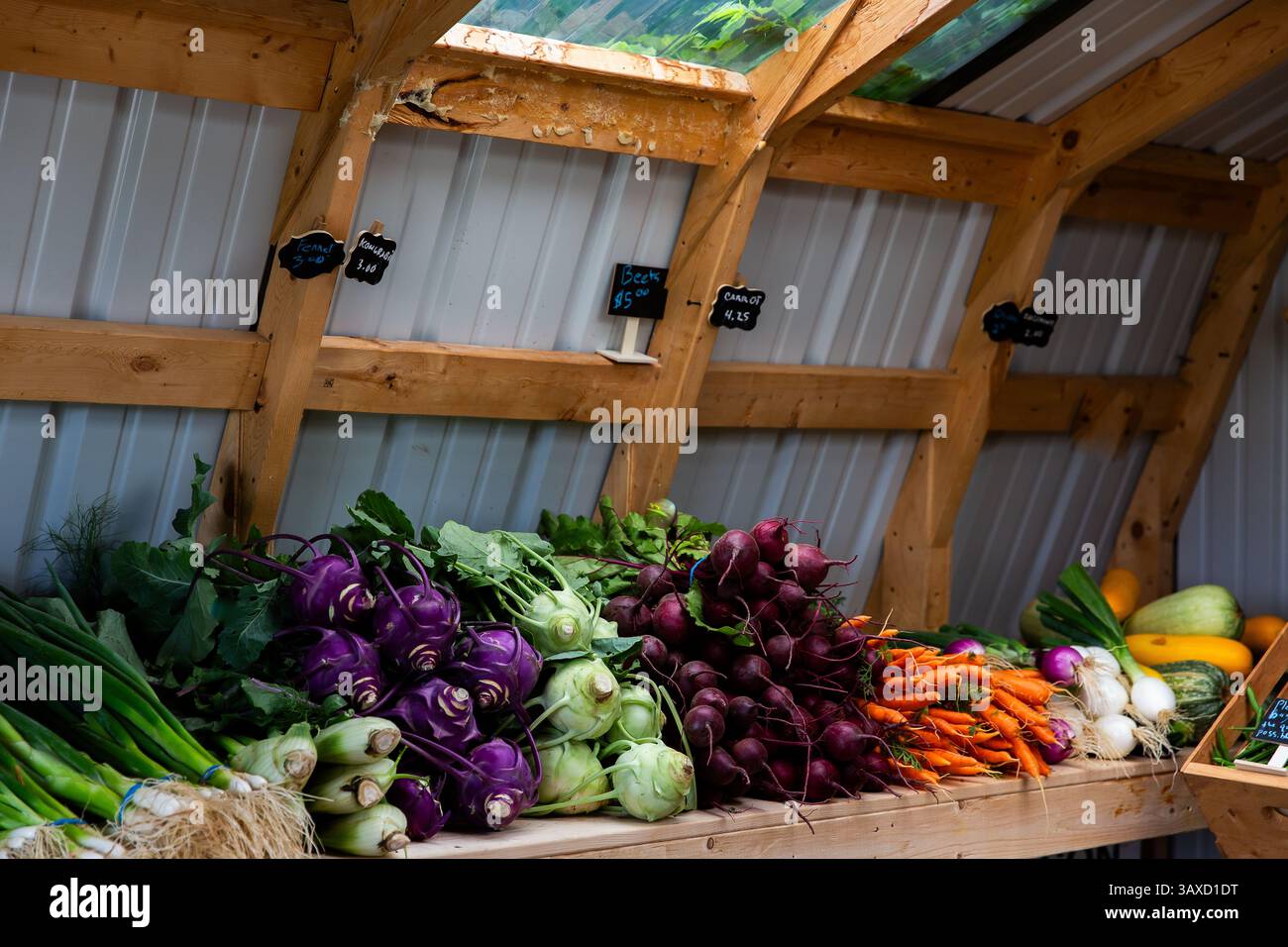 Stand with multiple vegetables for sale Stock Photo - Alamy
