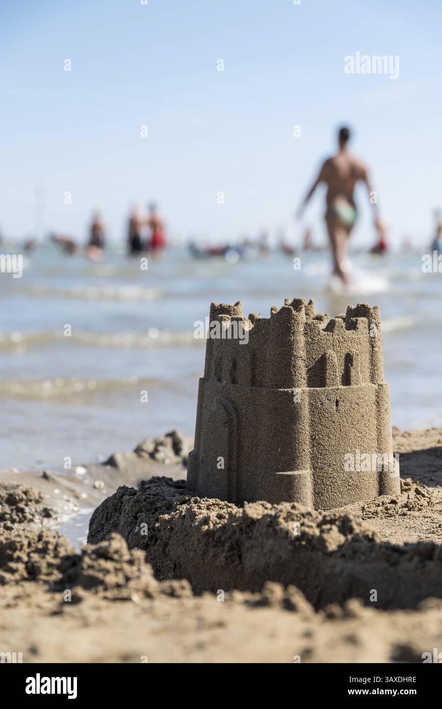 Beautiful sandcastle in front of the sea on the beach Stock Photo - Alamy
