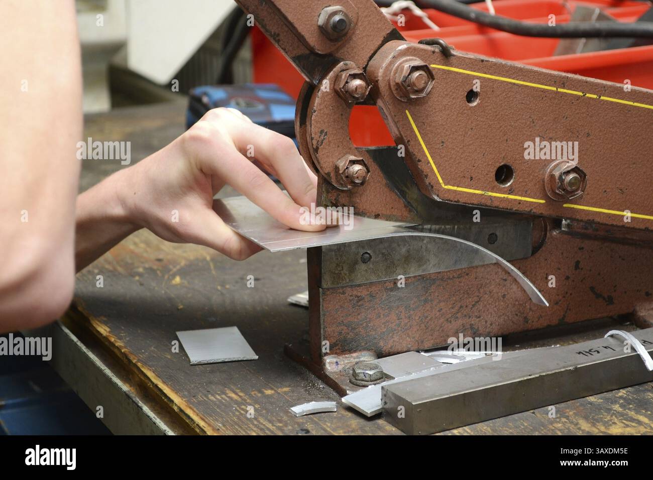 Cutting sheet metal with lever shears Stock Photo - Alamy