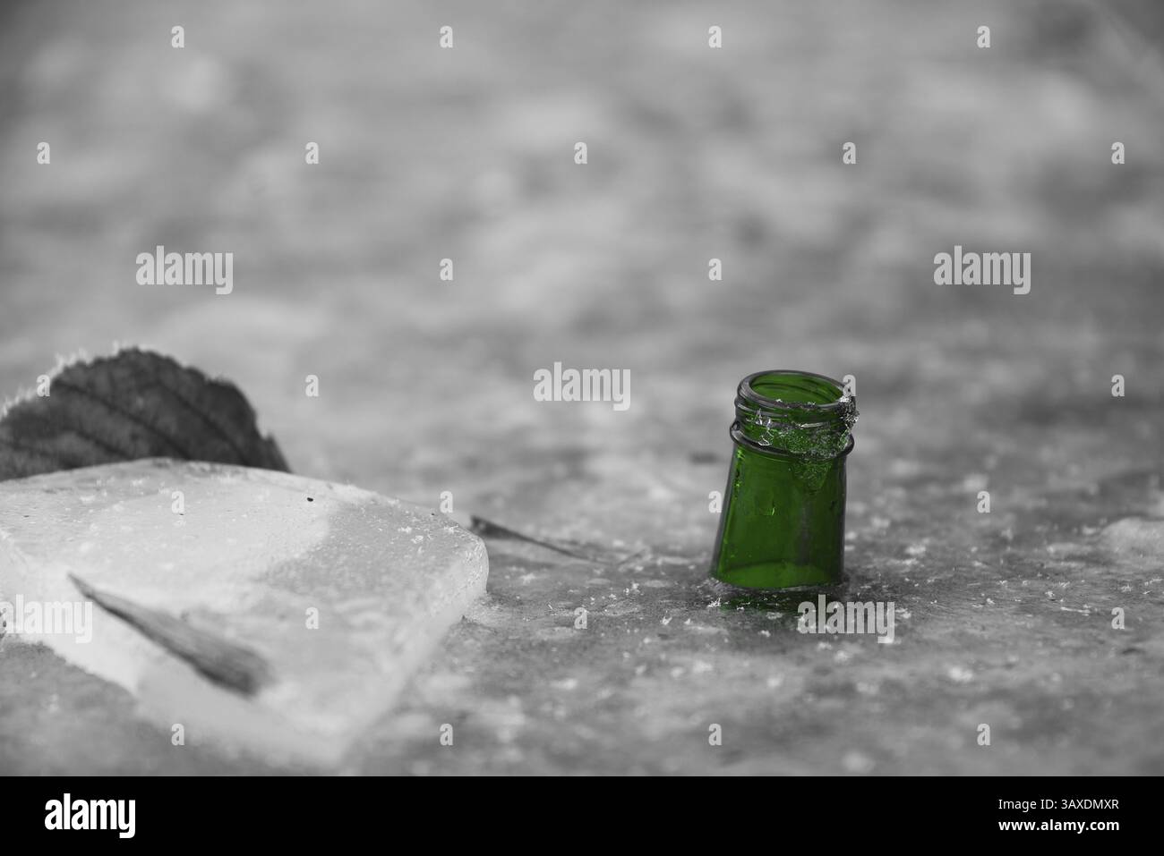 Water level indicator drinking bottle frozen in ice - emphasise effect ...