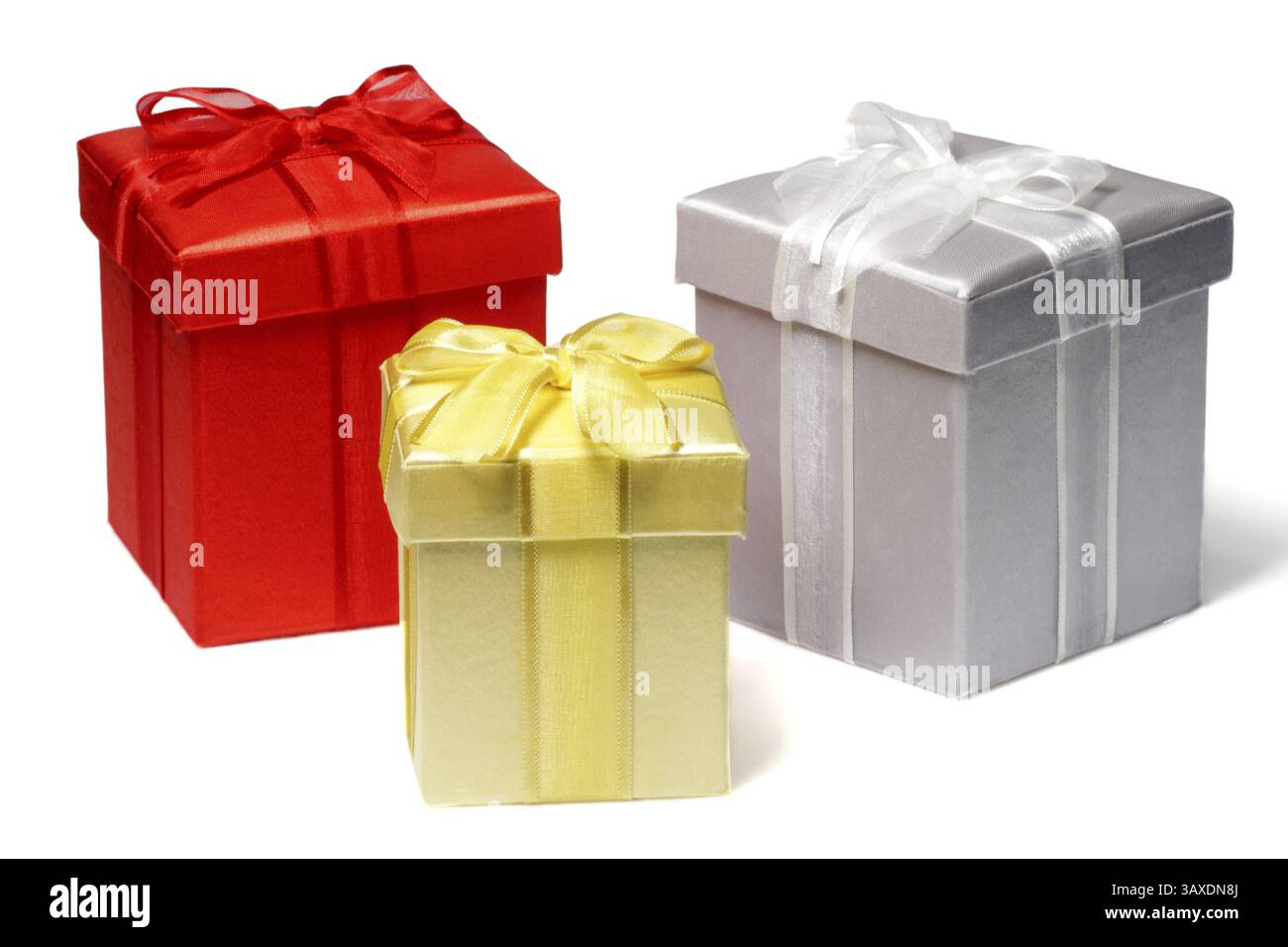 Different coloured gift boxes - cropped on a white background Stock ...