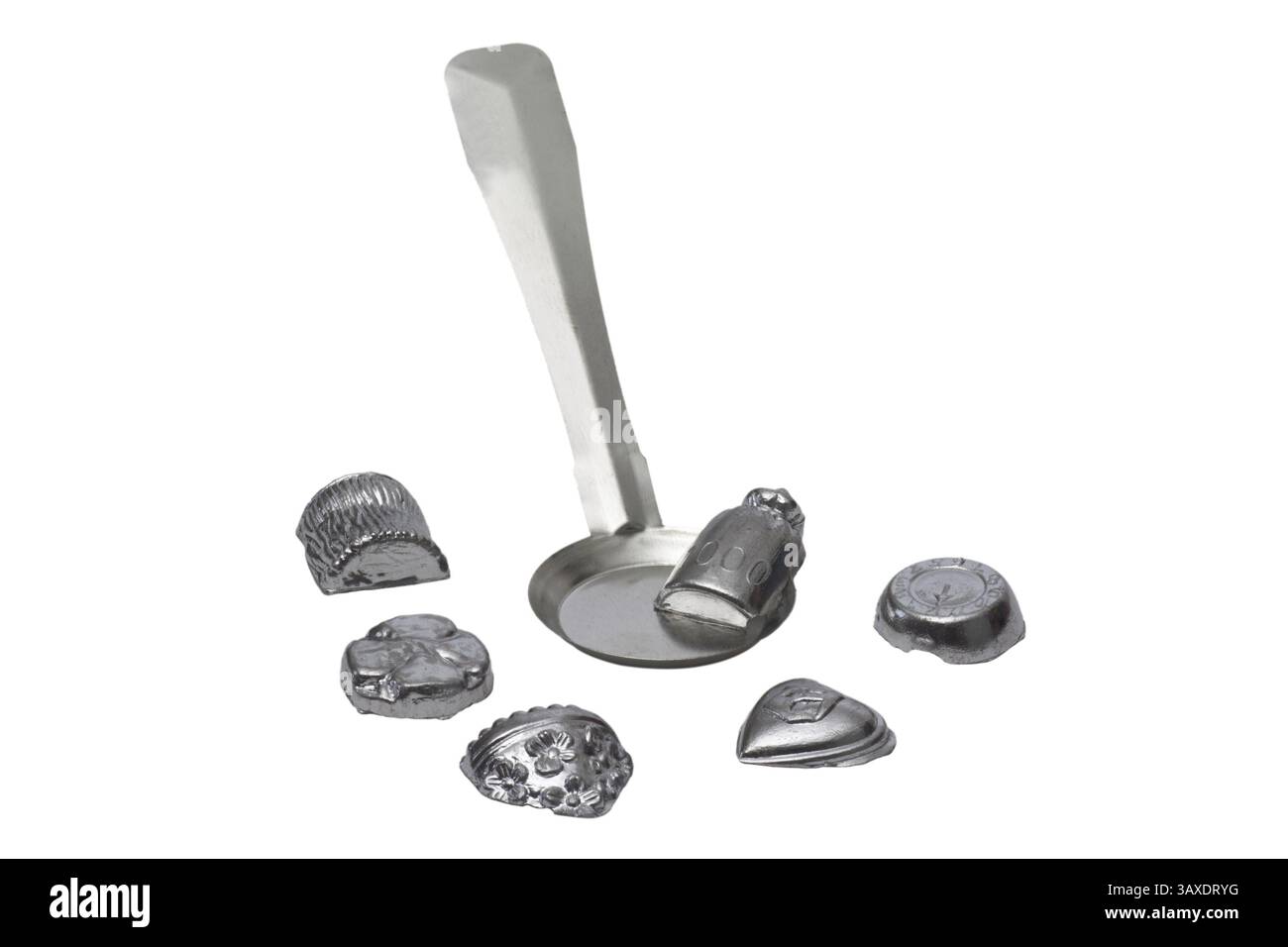 Pan with figures for lead casting on a white background Stock Photo - Alamy