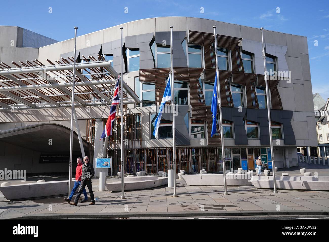 Flags fly at half-mast outside the Scottish Parliament in Edinburgh ...