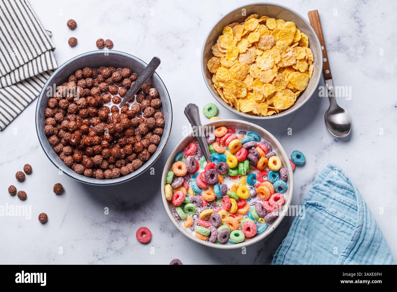 Different types of breakfast cereals background. Chocolate balls ...