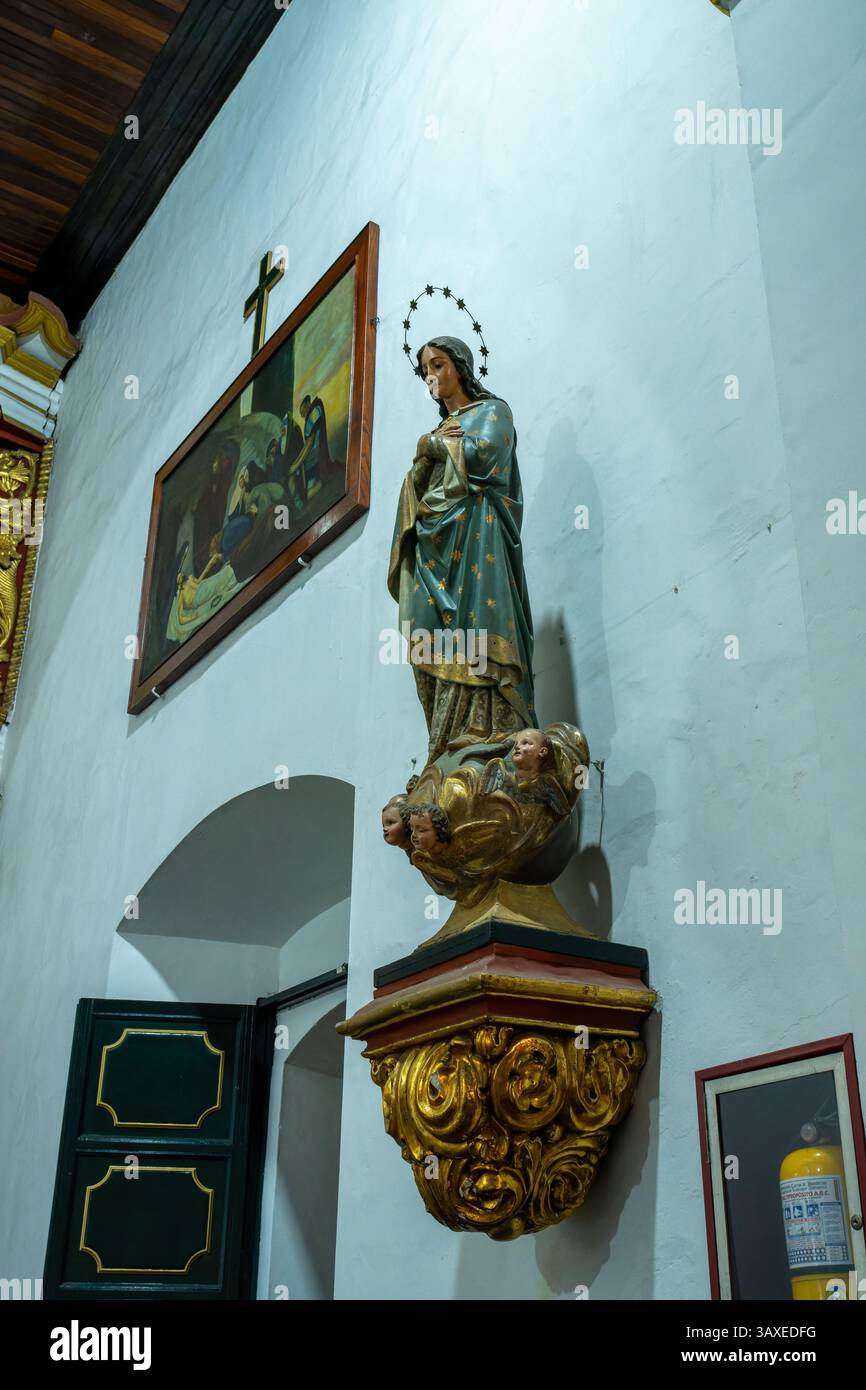 A statue of the Virgin Mary in the Cathedral of St. Nicholas in ...
