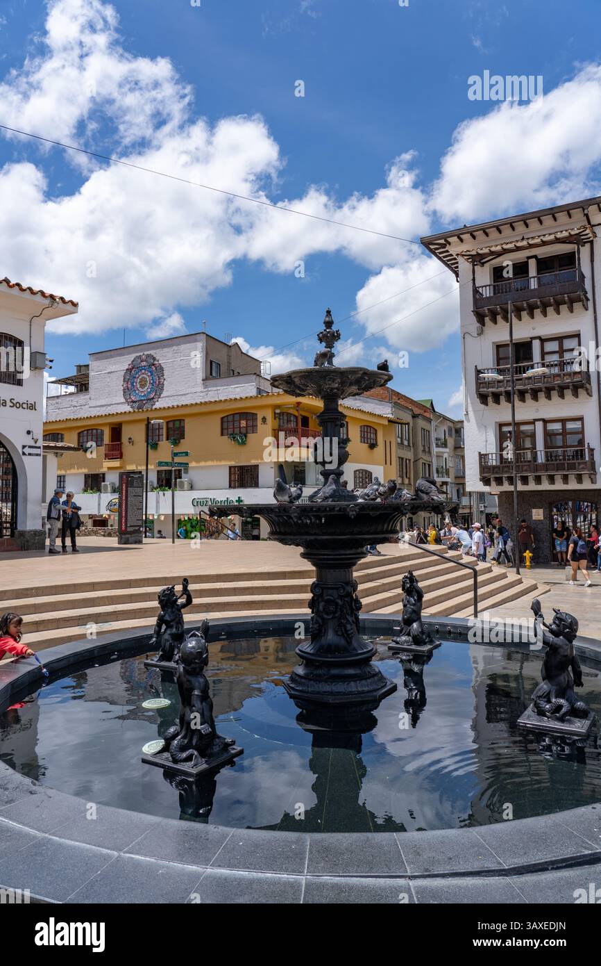 A bronze fountain on the main square of the city of Rionegro, Colombia ...