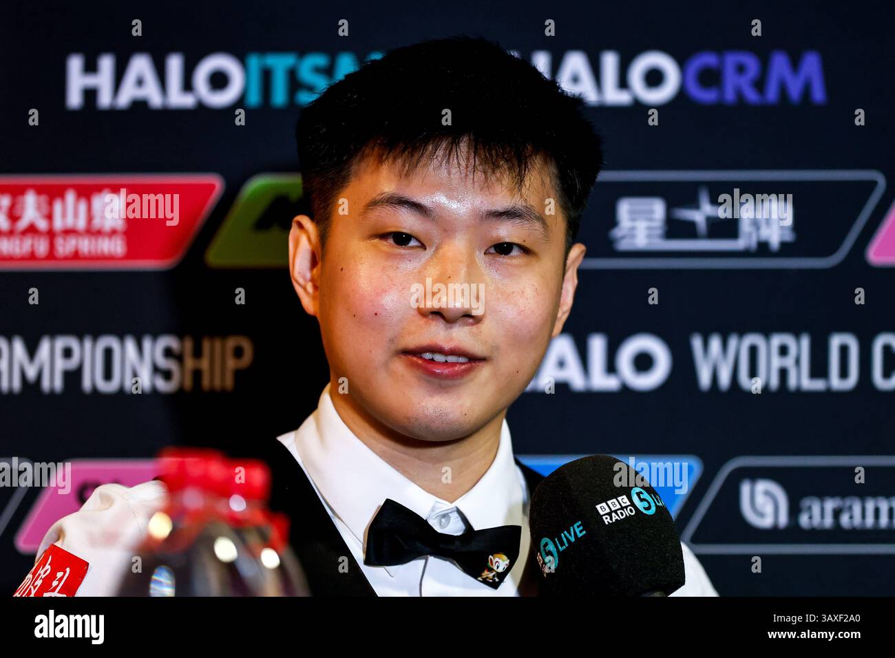 Zhao Xintong is interviewed after winning his match during the 2025 ...