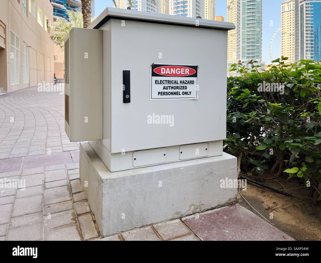 Electrical Hazard Warning Cabinets on Urban Street Stock Photo - Alamy