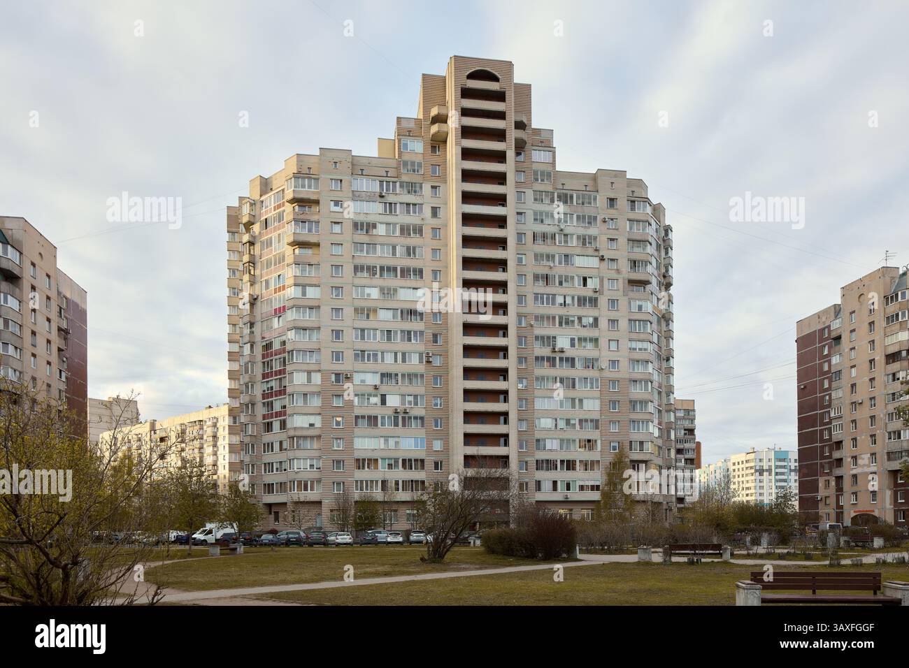 A Modern Residential Building Set in a Vibrant Urban Landscape with ...