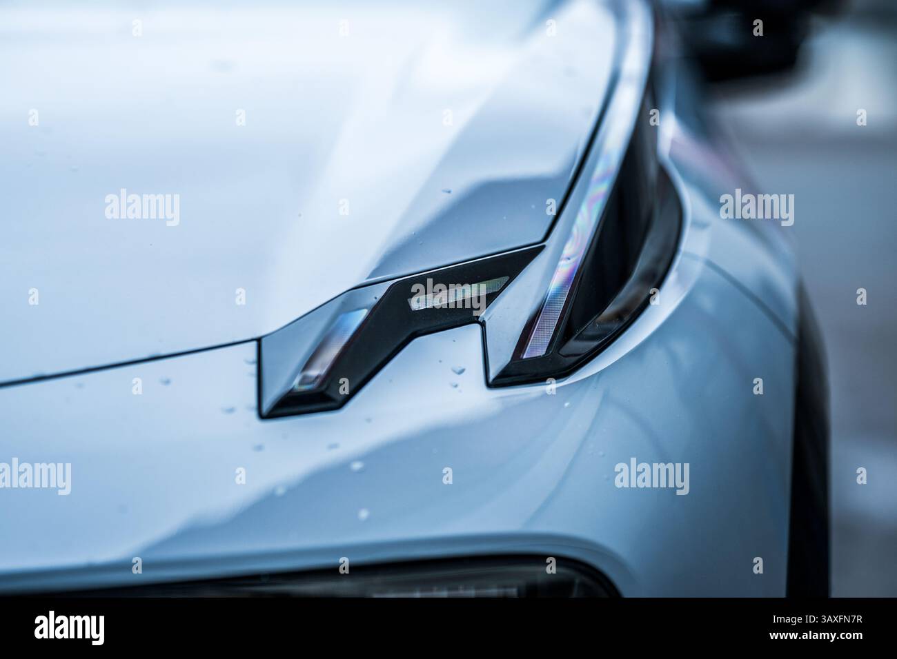 Closeup of futuristic car headlight design Stock Photo - Alamy