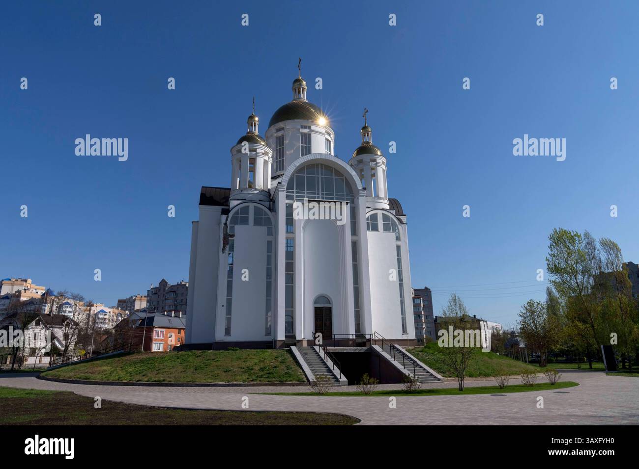 People attend the Easter Monday festivities at Church of St. Andrew and ...