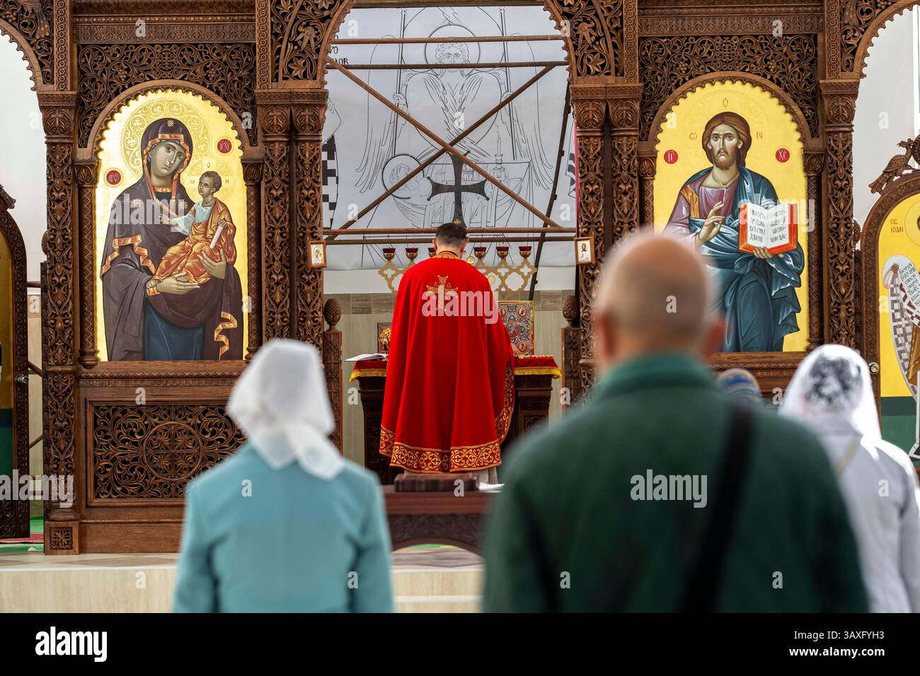 April 21, 2025, Bucha, Kyiv Oblast, Ukraine: People attend the Easter ...
