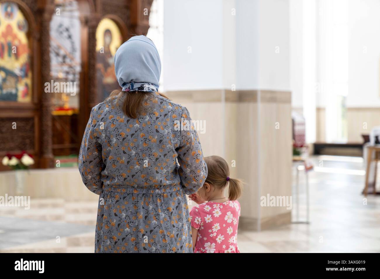Bucha, Kyiv Oblast, Ukraine. 21st Apr, 2025. People attend the Easter ...