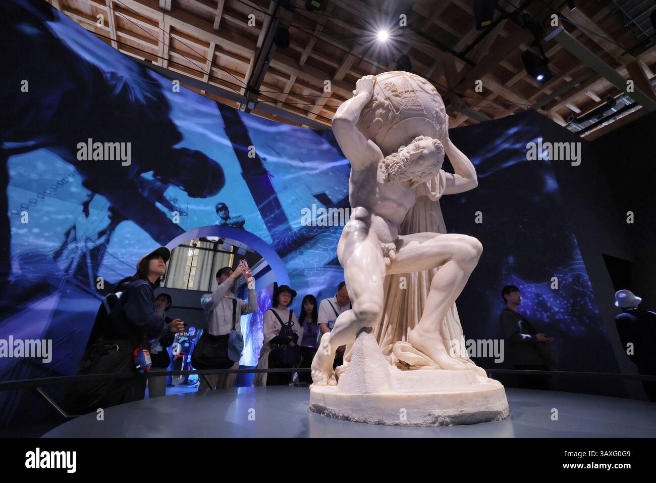A photo shows the marble statue of the "Farnese Atlas," known as a ...