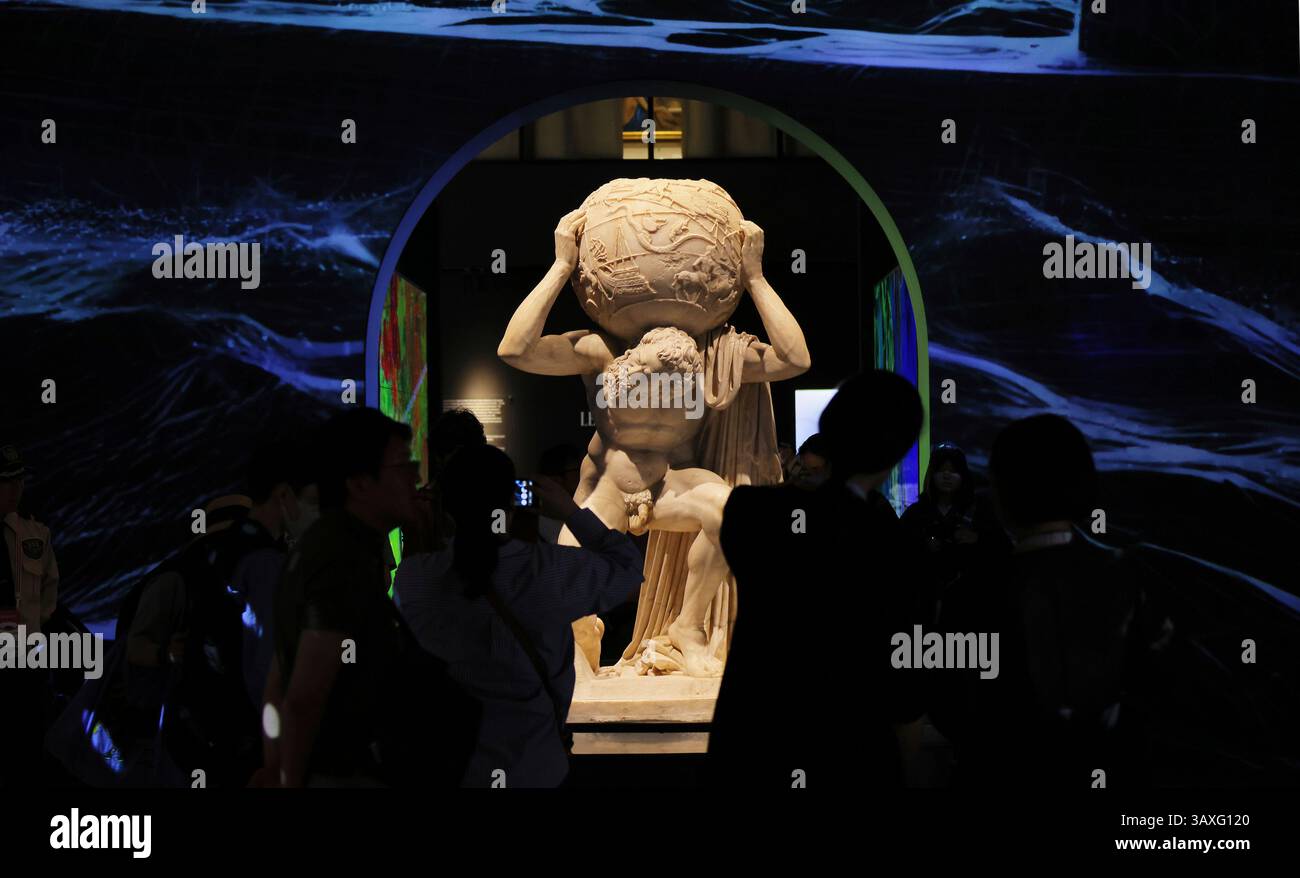 A photo shows the marble statue of the "Farnese Atlas," known as a ...