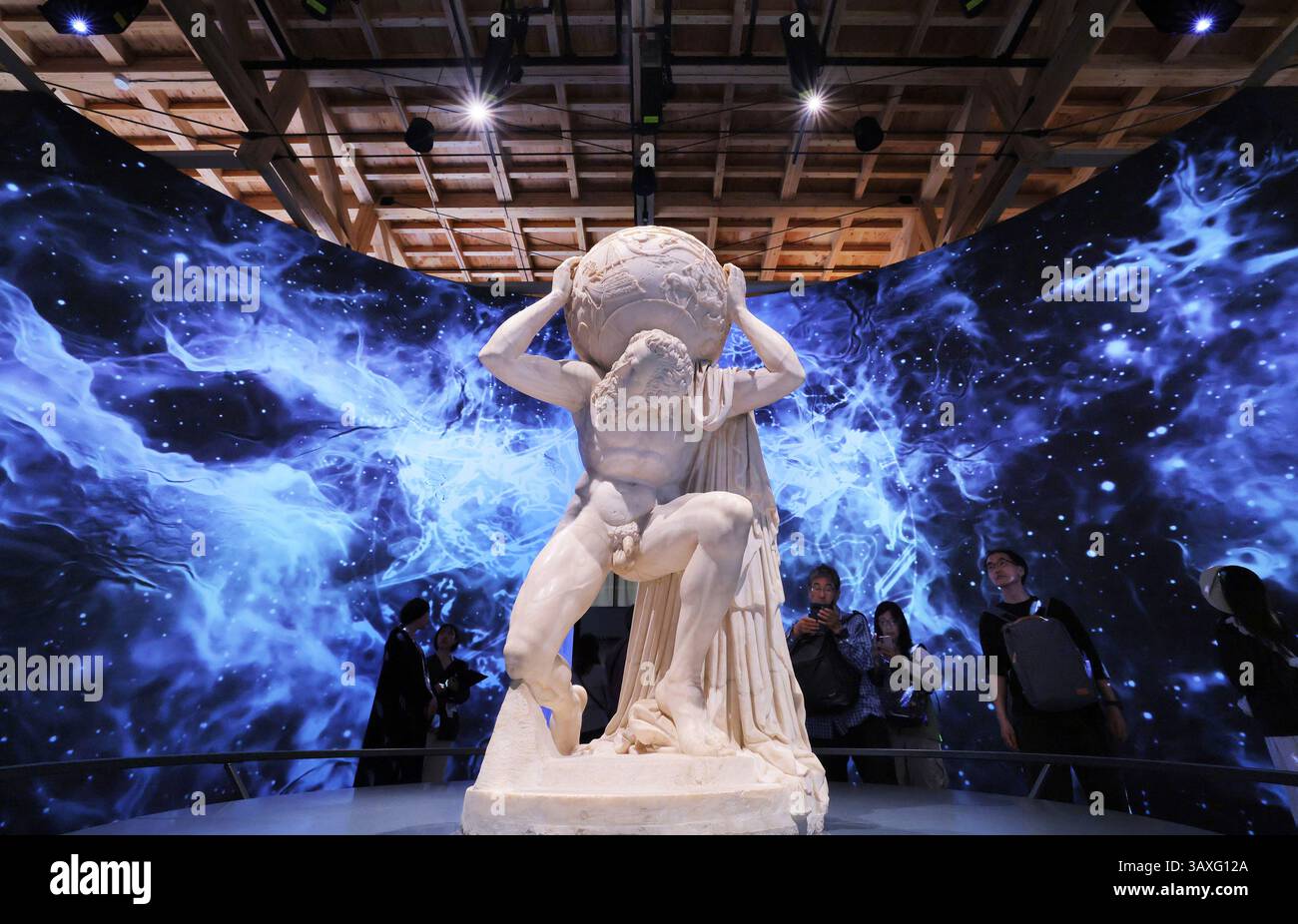 A photo shows the marble statue of the "Farnese Atlas," known as a ...