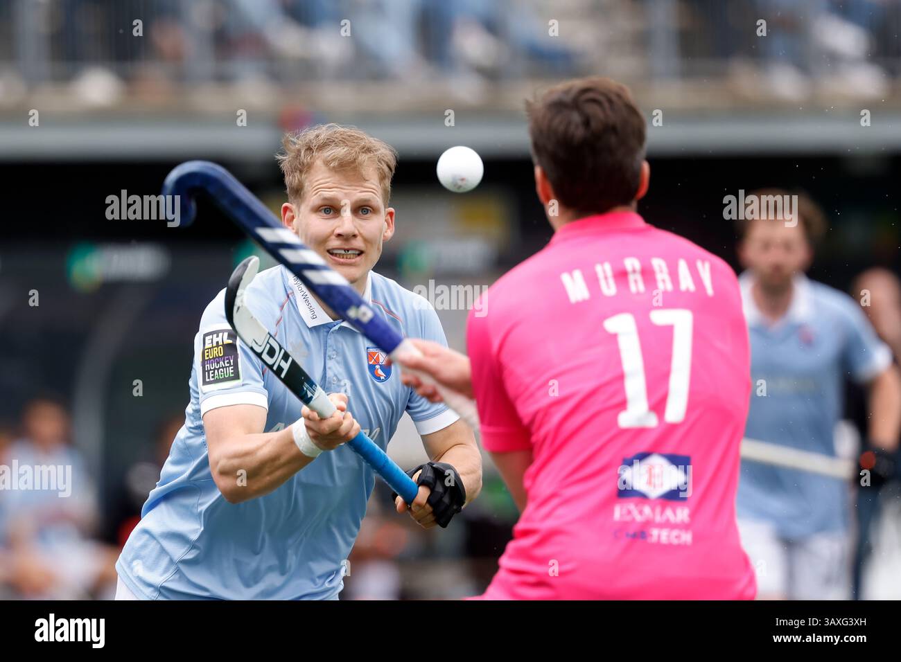 DEN BOSCH - Hockey player Jasper Brinkman (L) of Bloemendaal in dueling ...