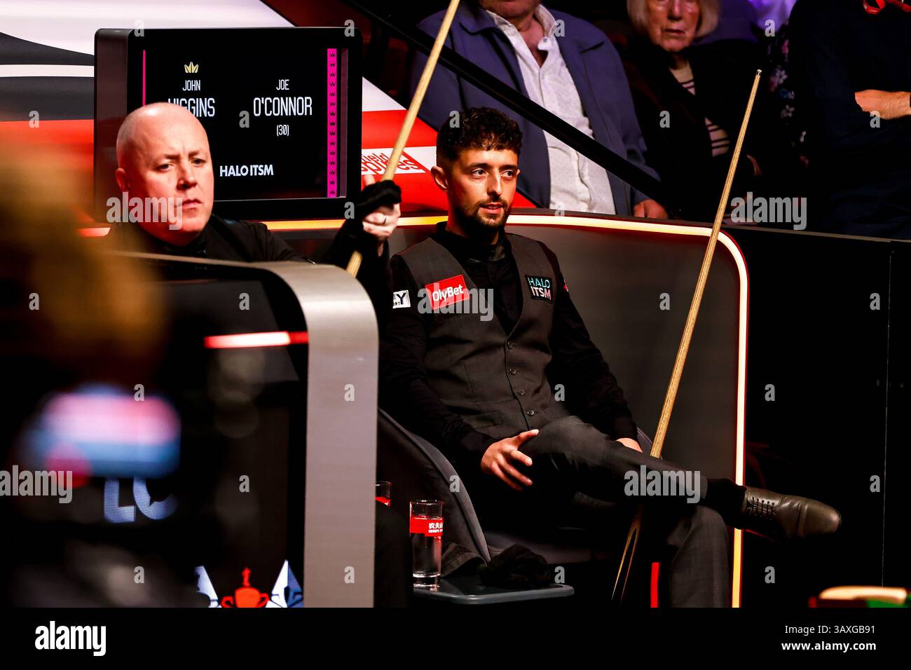 Sheffield, UK. 21st Apr, 2025. John Higgins and Joe O'Connor sit during ...