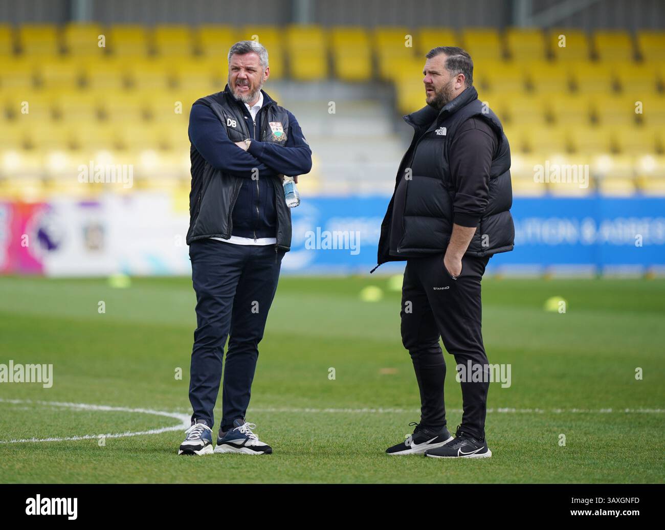 Barnet head coach Dean Brennan (left) on the pitch before the Vanarama ...