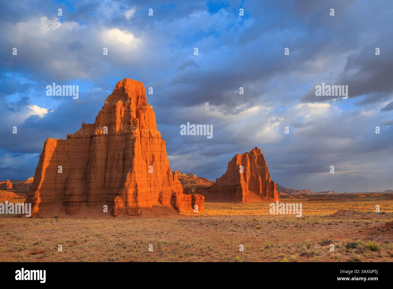 morning light on temples of the moon and sun in lower cathedral valley ...