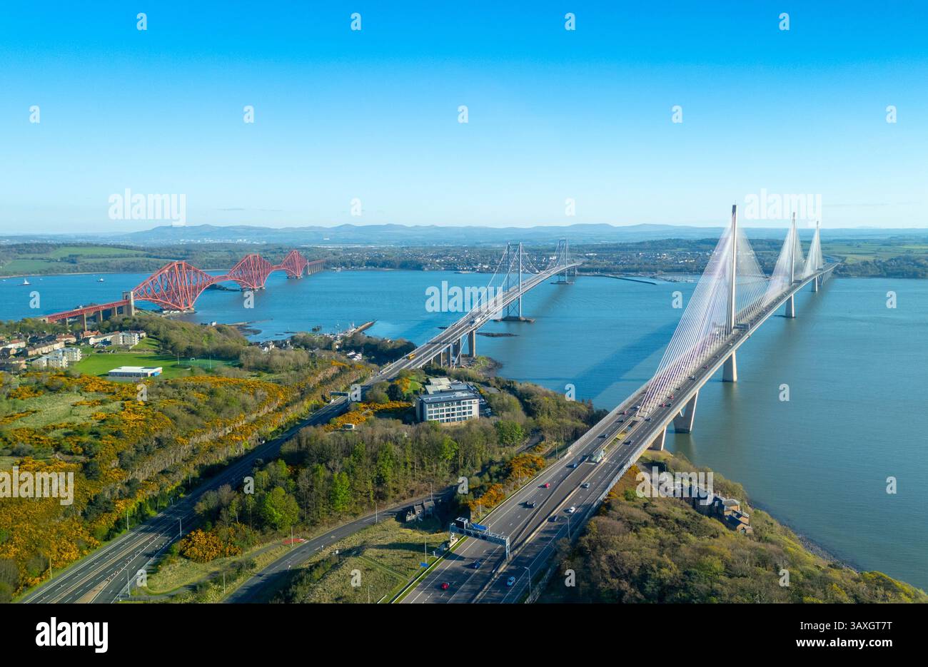 Aerial view of three bridges crossing the Firth of Forth at North ...