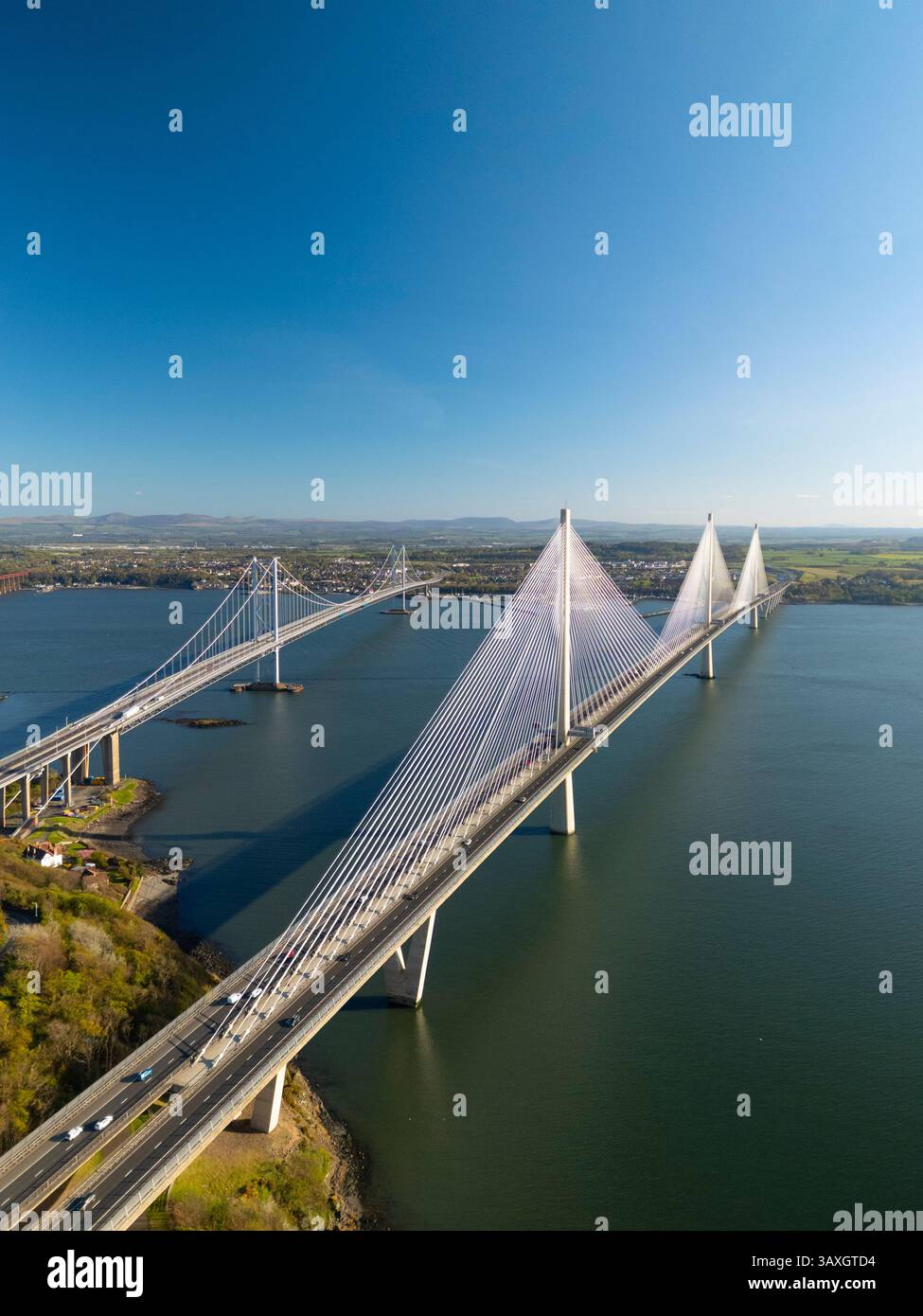Aerial view of Forth Road Bridge and Queensferry Crossing bridges over ...