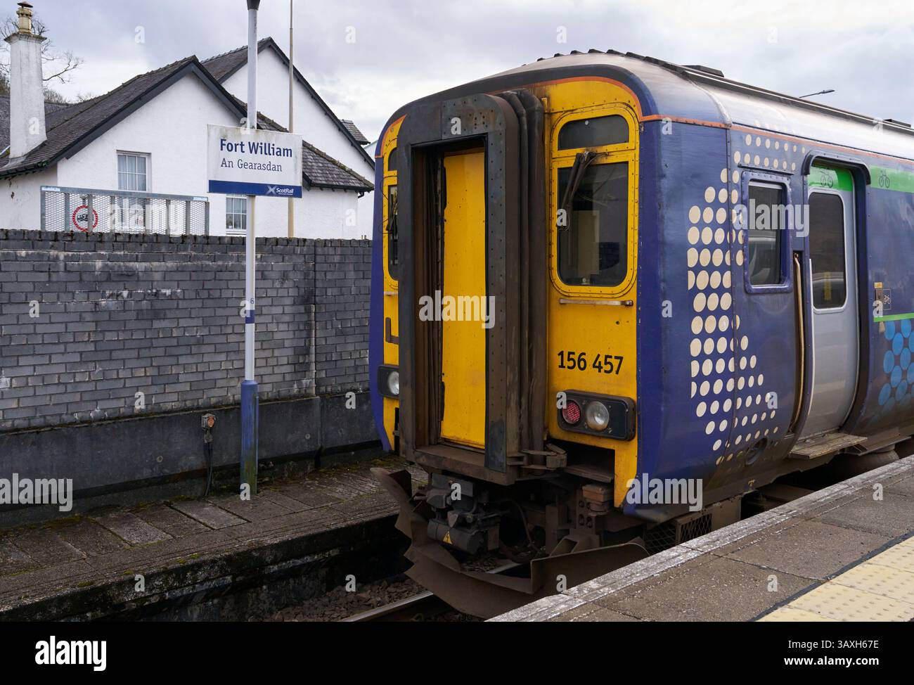 Class 156 diesel train stands at platform at Fort William station Stock ...