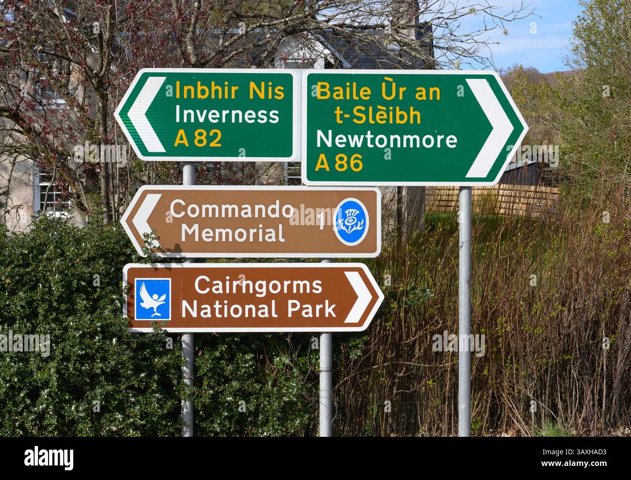 Direction signs to towns and tourist attractions at road junction in ...