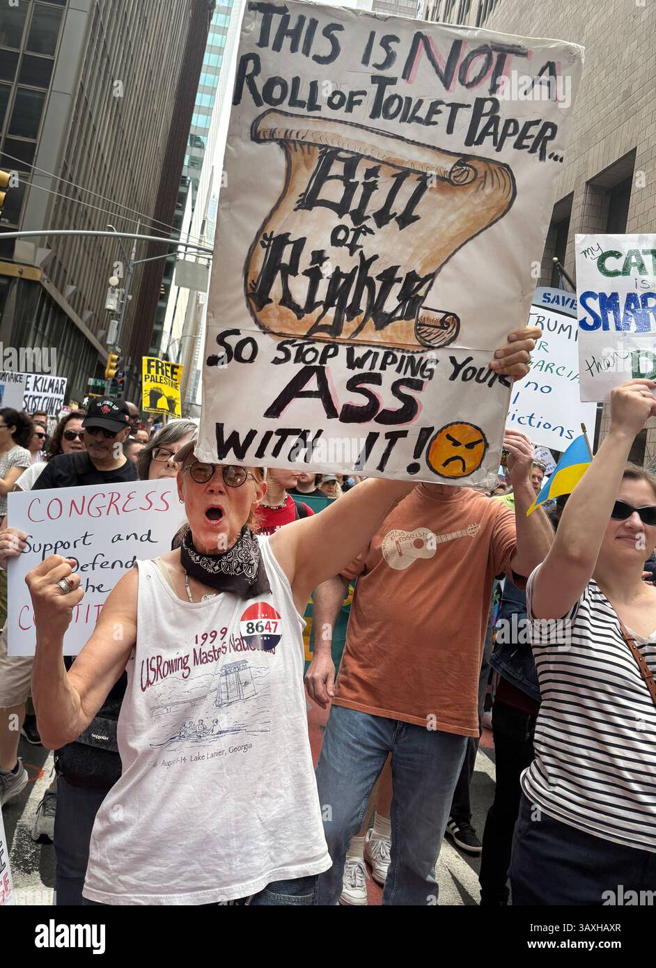 A protester holds a placard expressing her opinion during the national ...