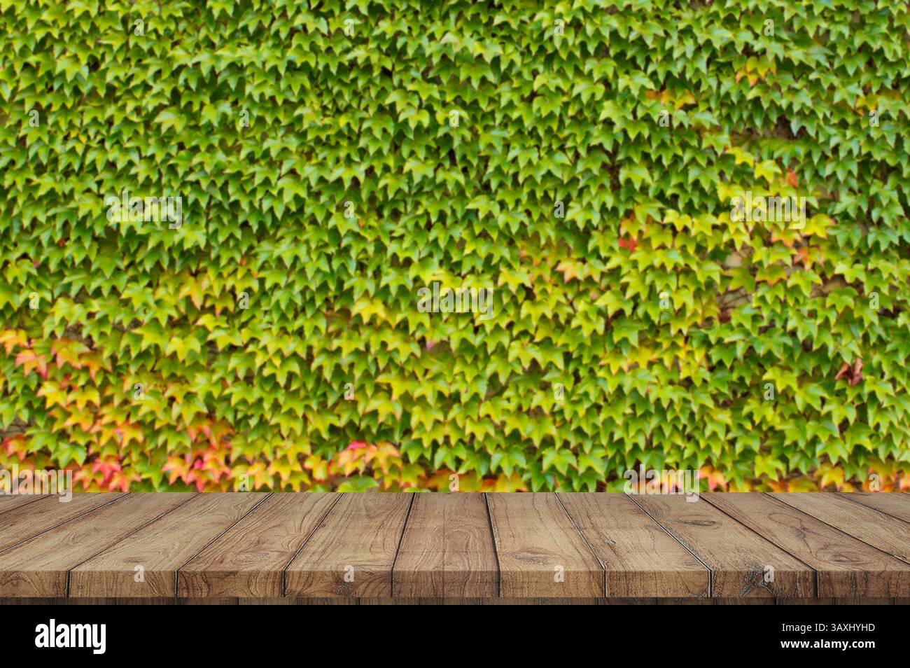 An empty wooden countertop against a brick wall Stock Photo - Alamy