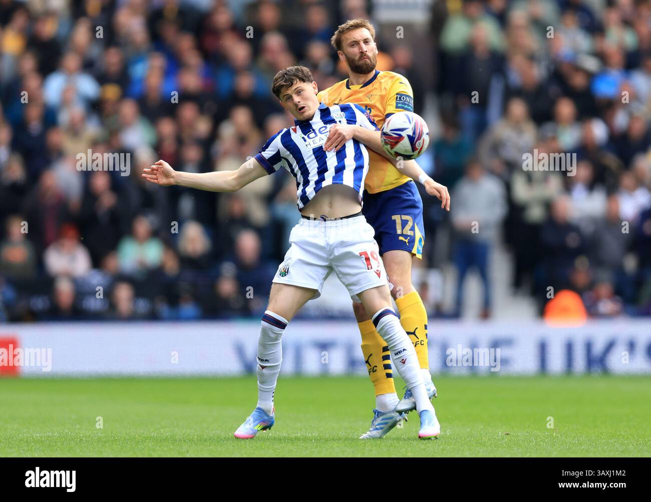West Bromwich Albion's Will Lankshear (left) and Derby County's ...