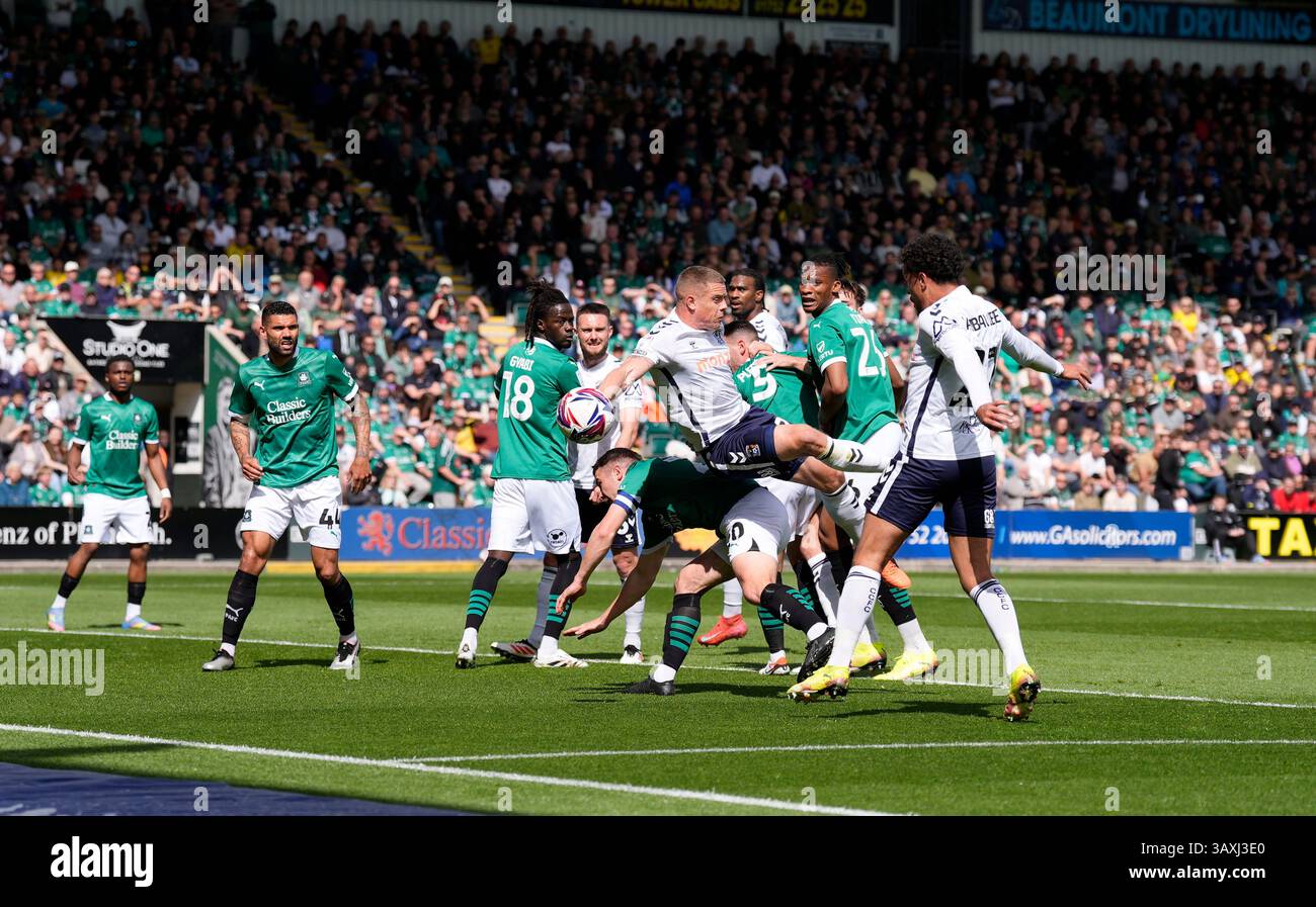 Coventry City's Jake Bidwell and Plymouth Argyle's Adam Randell battle ...
