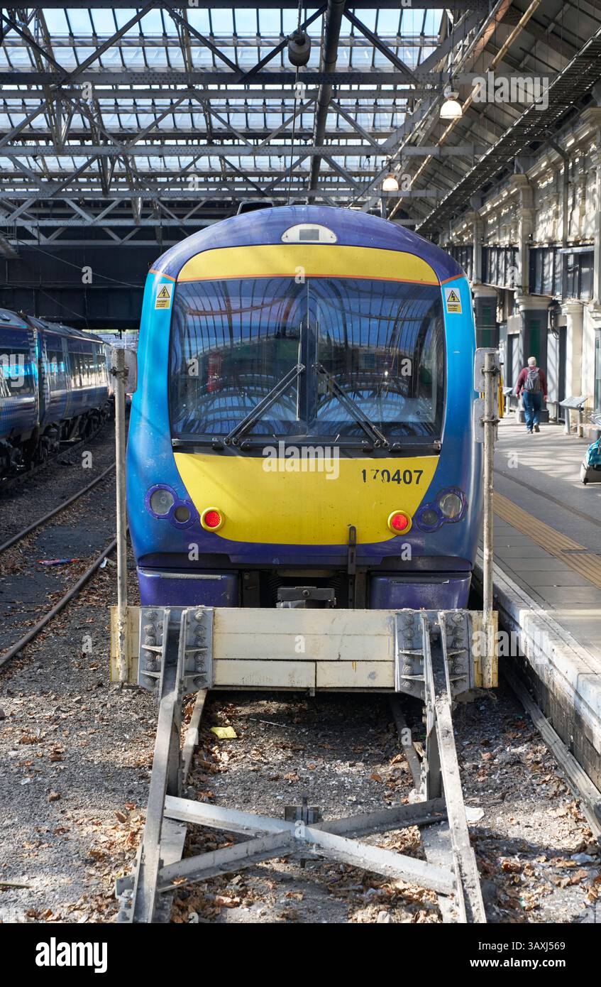 Class 170 diesel multiple-unit train standing at platform 12 in ...