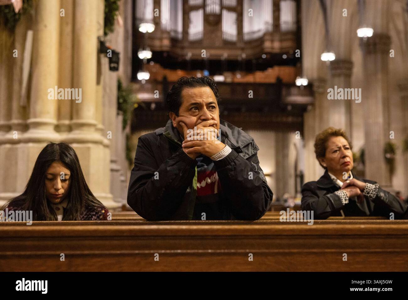 Parishioners pray at St. Patrick's Cathedral, Monday, April 21, 2025 ...