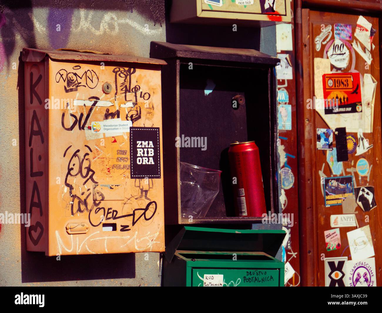 Graffiti-Decorated Postal Boxes on a Colorful Urban Wall, Metelkova ...