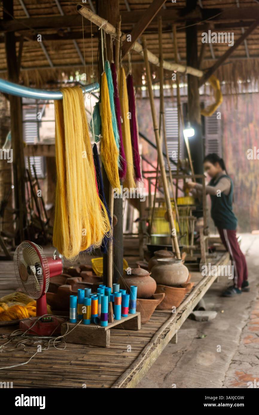 natural silk drying at traditional rural textile workshop in cambodia ...